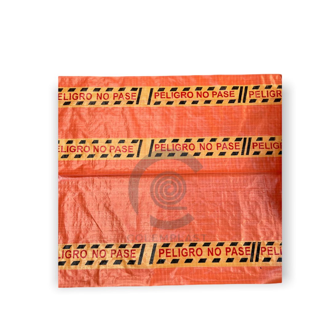 Tela naranja impresa "PELIGRO NO PASE" de 1 MT X 100 MTS - Colemplast